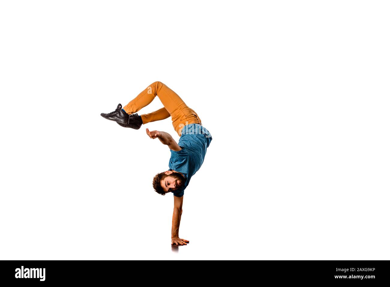 Amazing dancer is doing breakdance on a white background Stock Photo ...