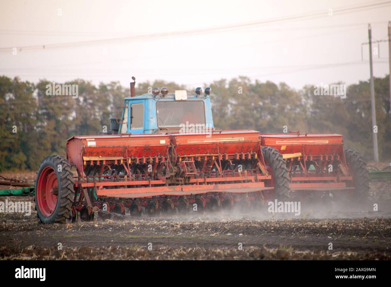 Agricultural mechanical seeders of grain crops. Tactor with a seeder ...