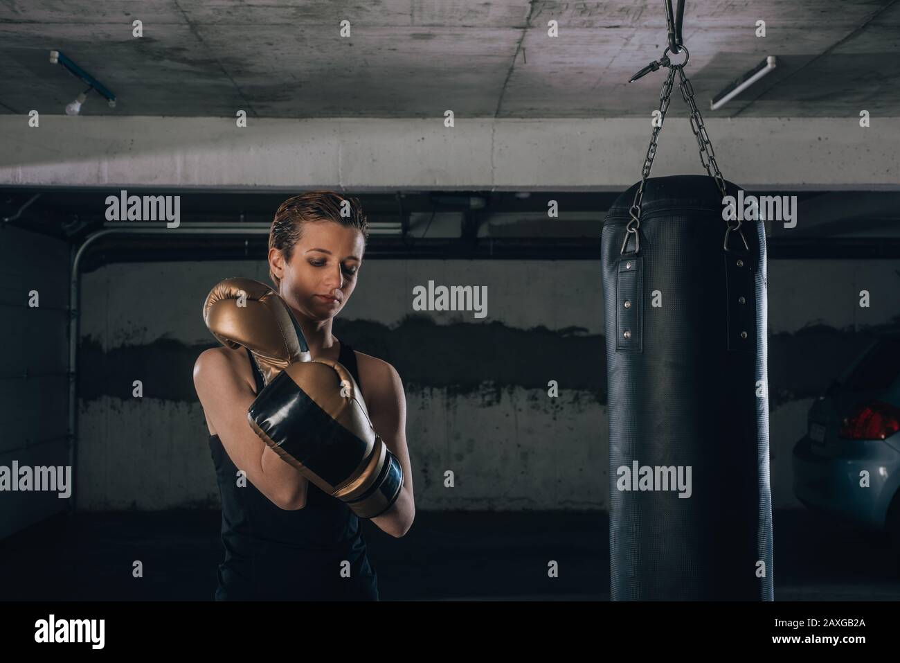 Gold boxing gloves hi-res stock photography and images - Alamy