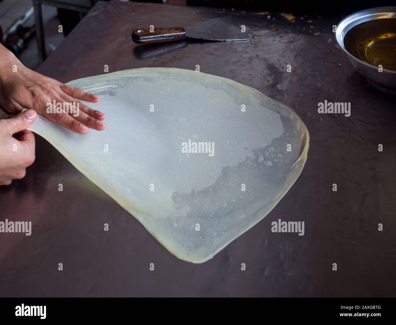 Roti Making, roti thresh flour by roti maker with oil. Indian ...