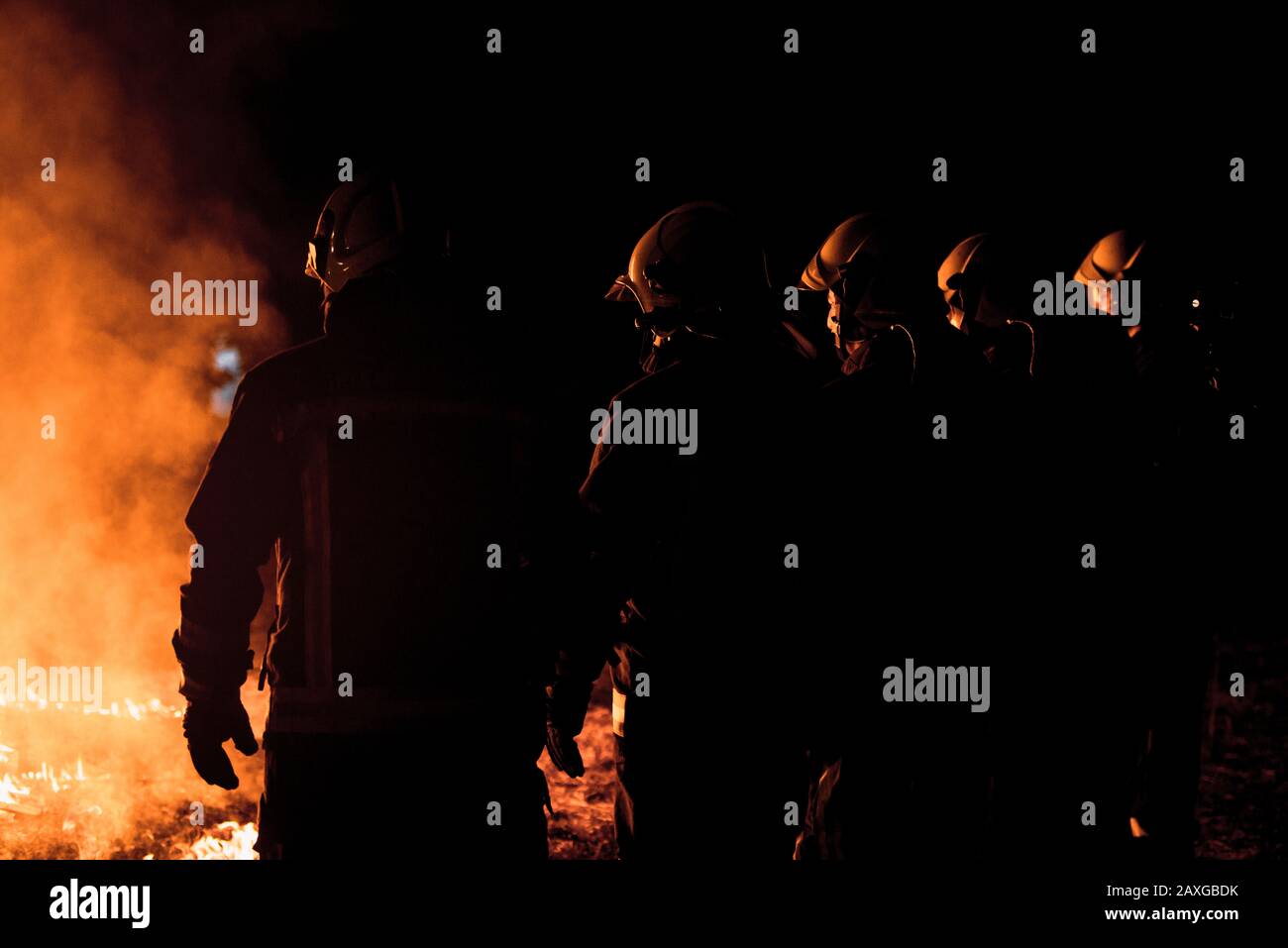 Fire department team forming a plan during an operation Stock Photo - Alamy