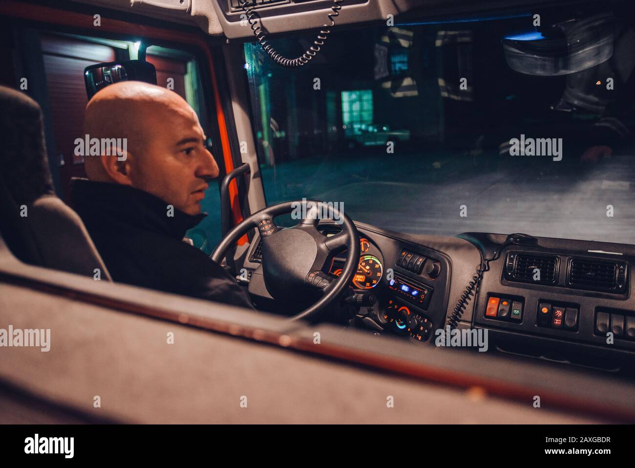 Inside view of a firefighting truck with a fireman driver Stock Photo ...