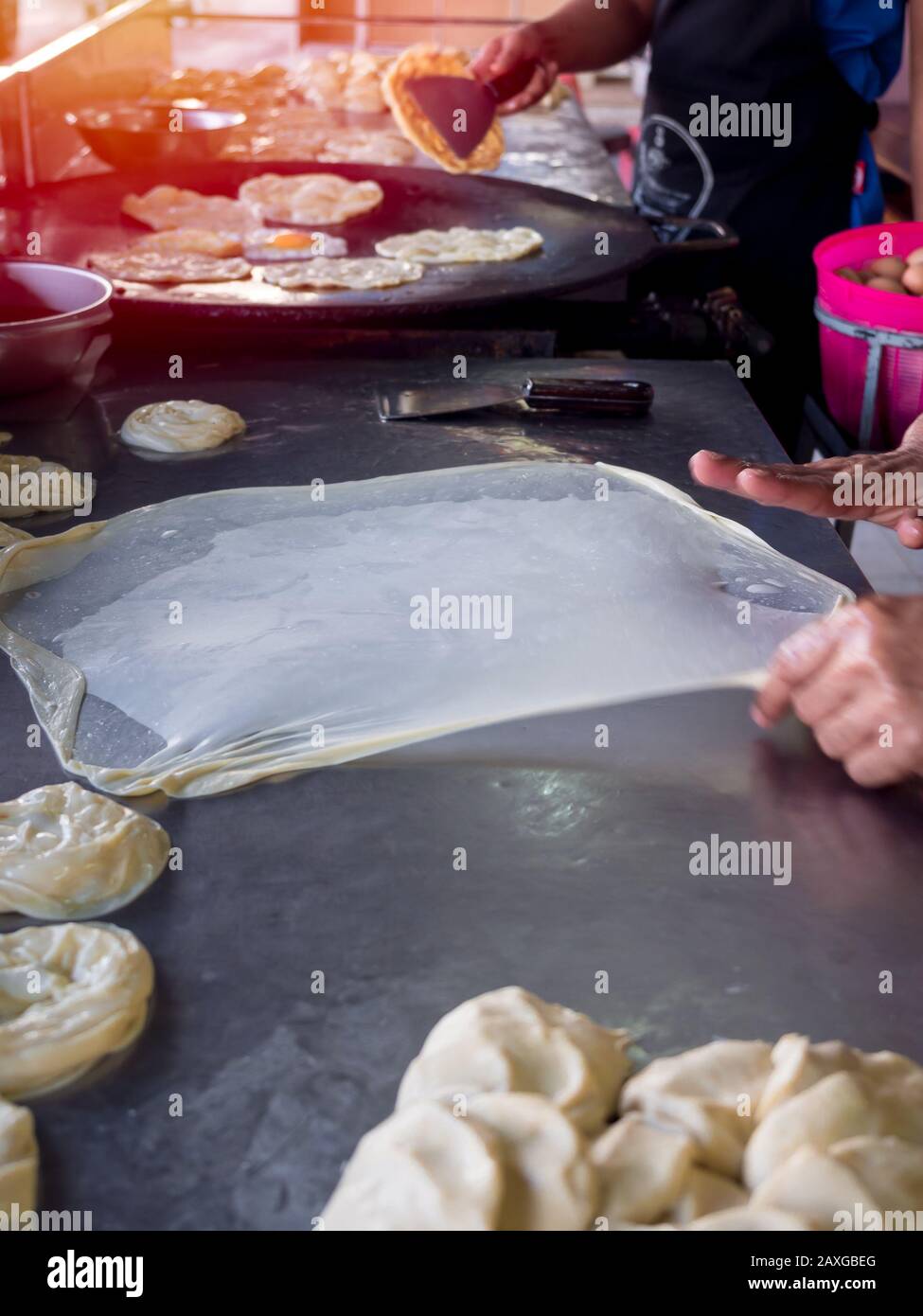 Roti Making, roti thresh flour by roti maker with oil. Indian ...