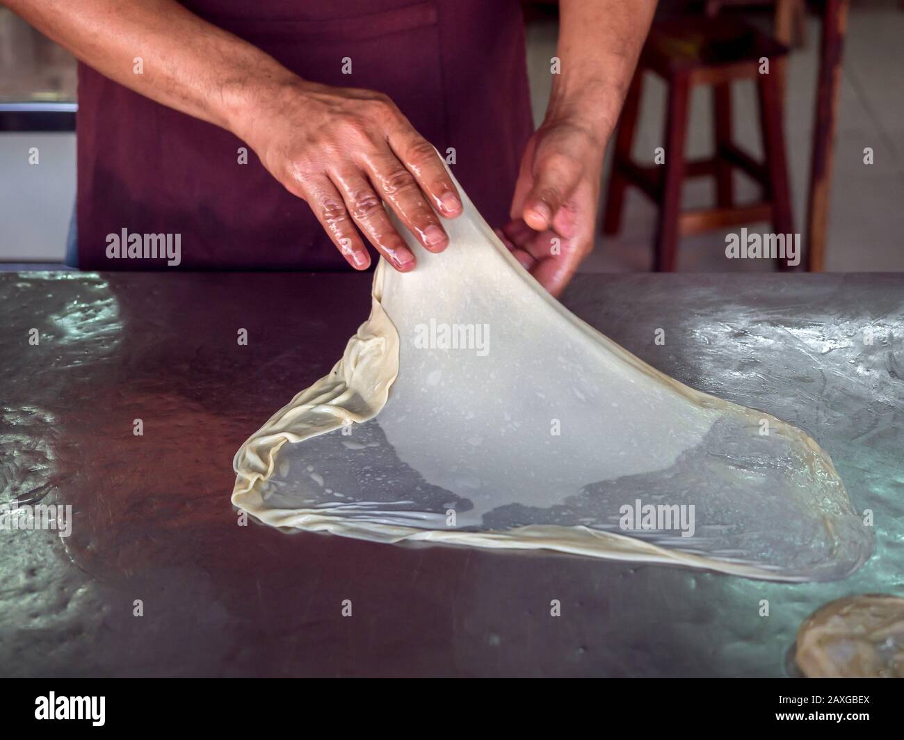 Roti Making, roti thresh flour by roti maker with oil. Indian ...