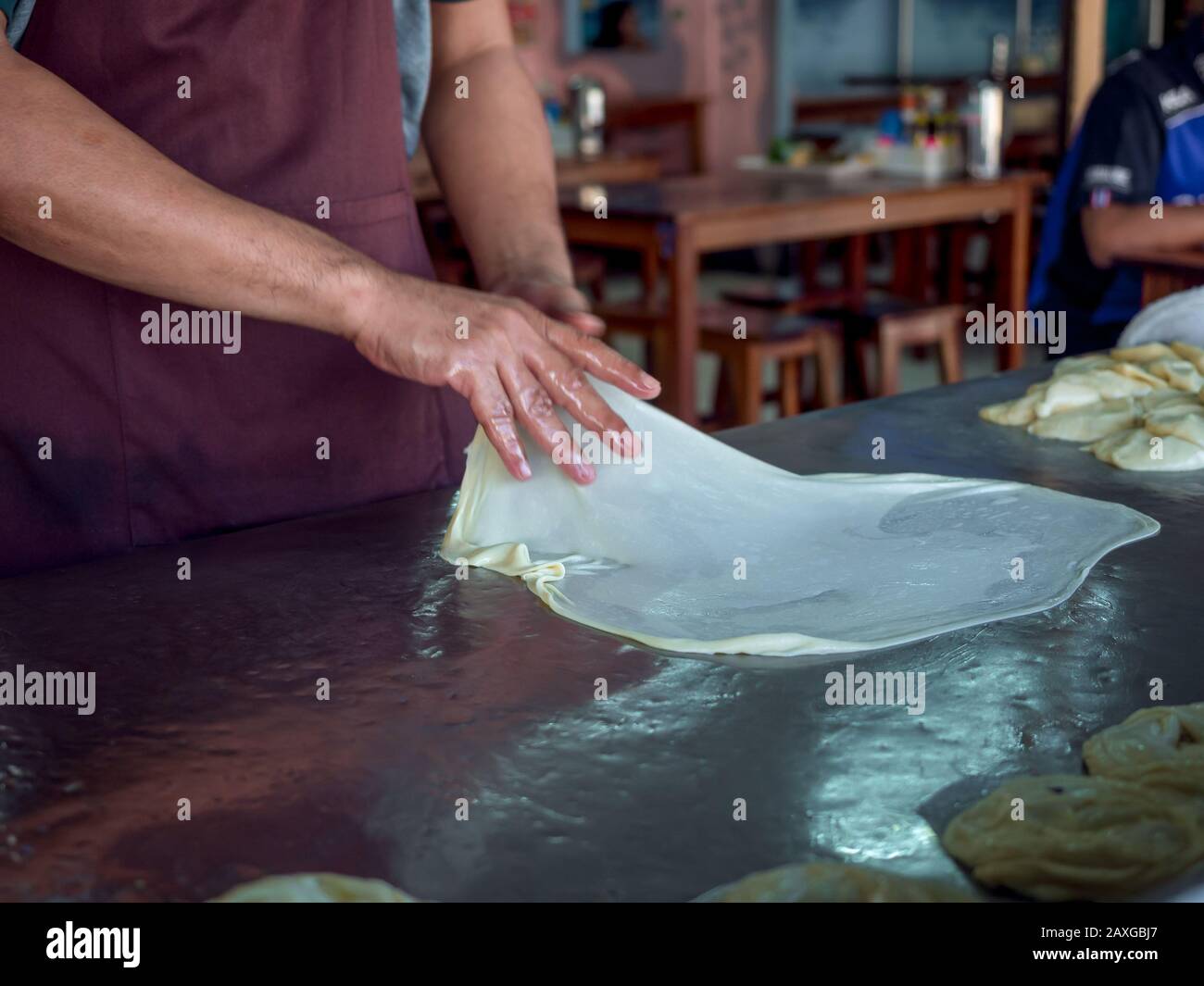 Roti Making, roti thresh flour by roti maker with oil. Indian ...