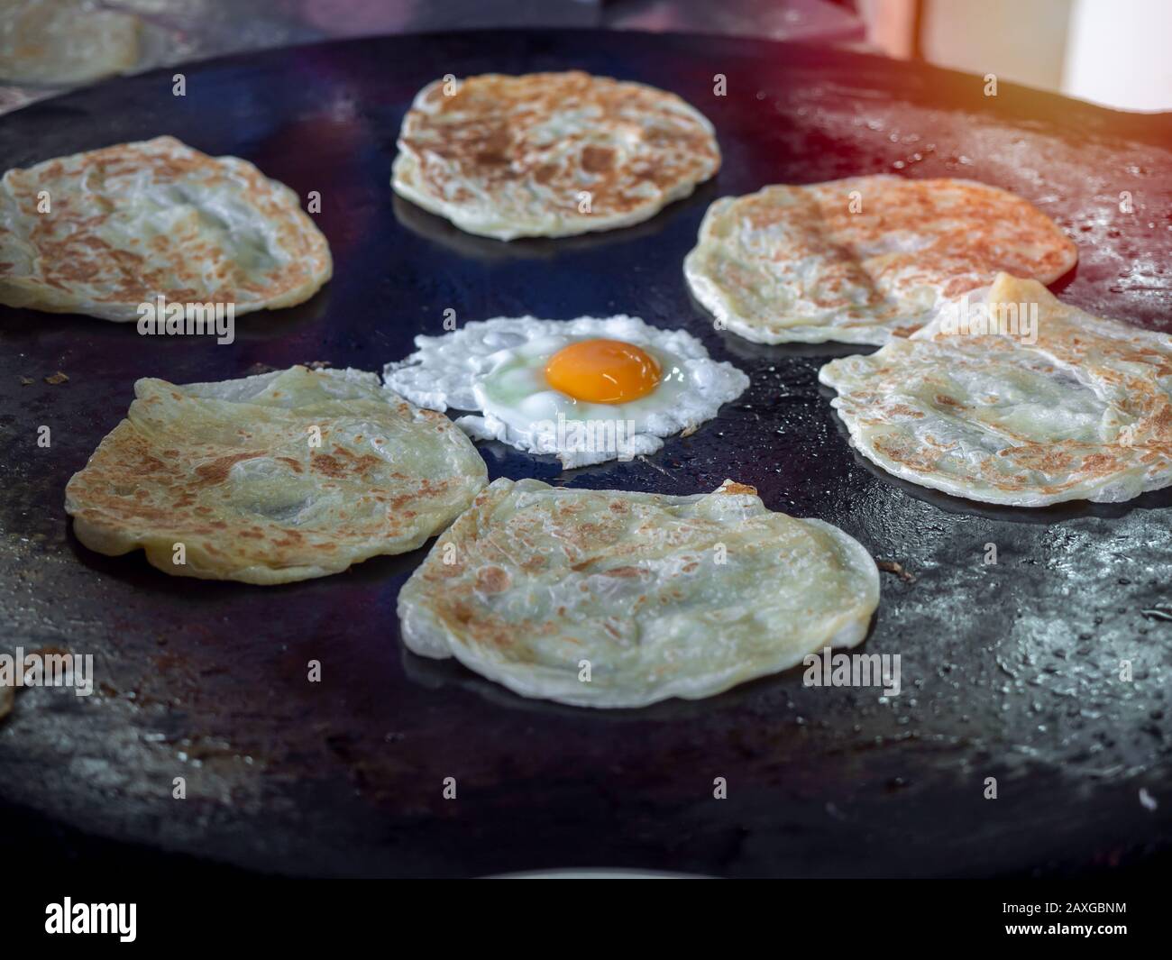 Roti Making, roti thresh flour by roti maker with oil. Indian ...