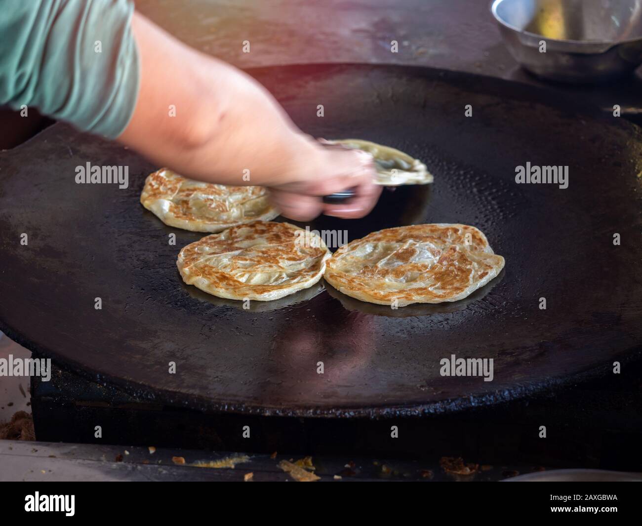 Roti Making, roti thresh flour by roti maker with oil. Indian ...