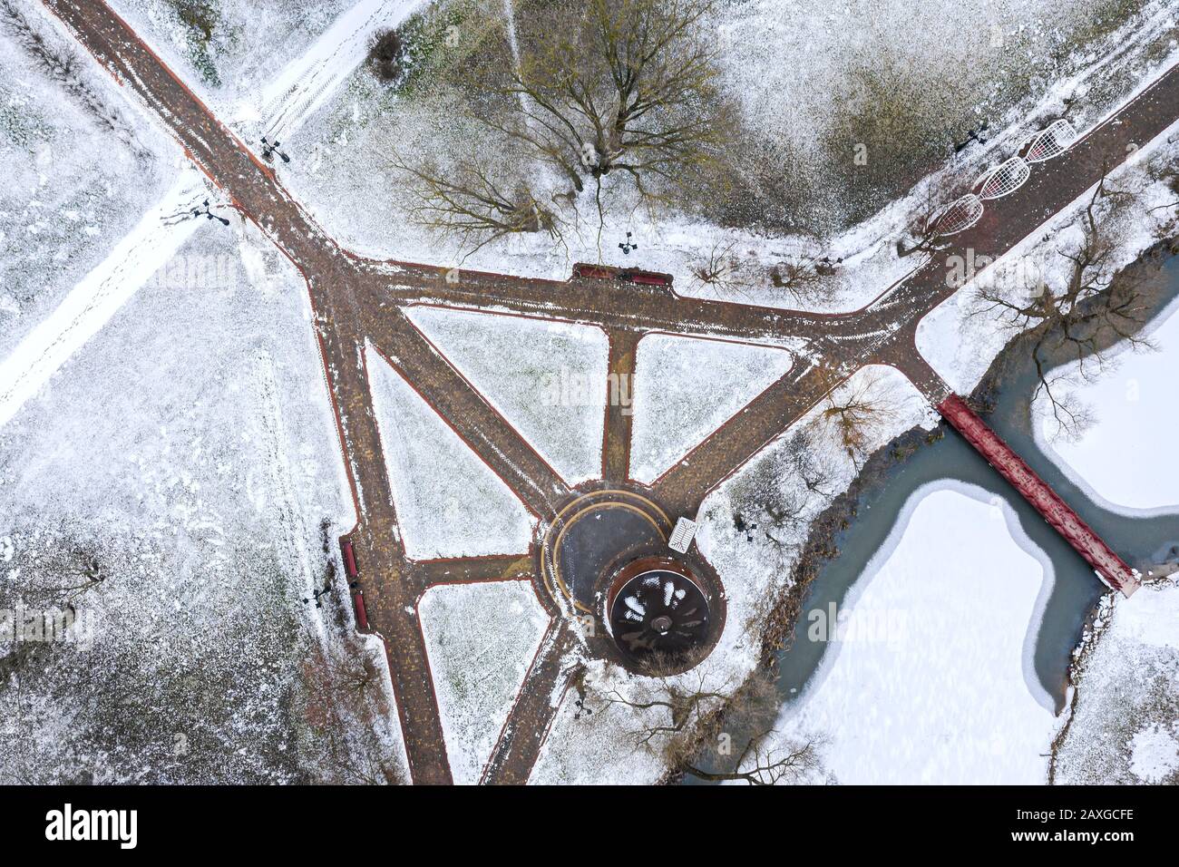 aerial top view of snowy park and frozen river in winter season Stock ...