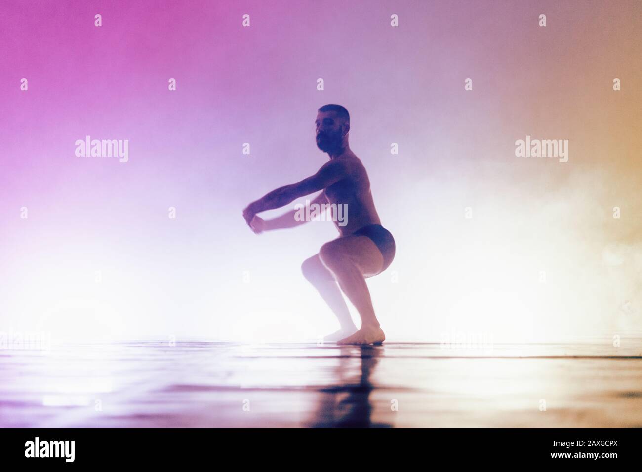 Contemporary dancing male performer in dance practice class Stock Photo ...
