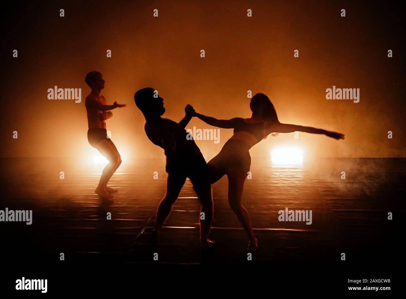 Group of contemporary dancers practicing a dance routine Stock Photo ...