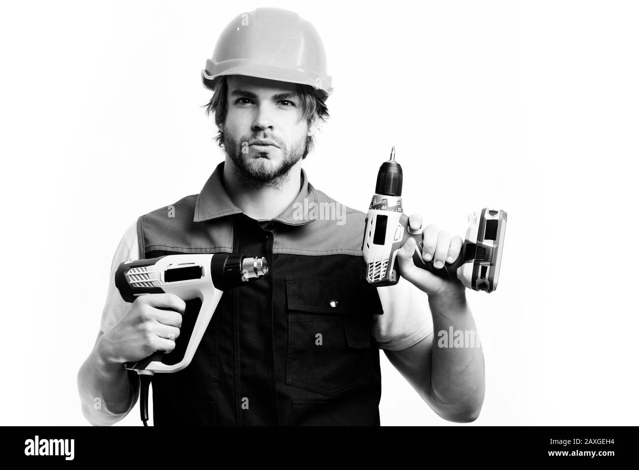 Construction worker holds yellow building tools. Finished work and ...