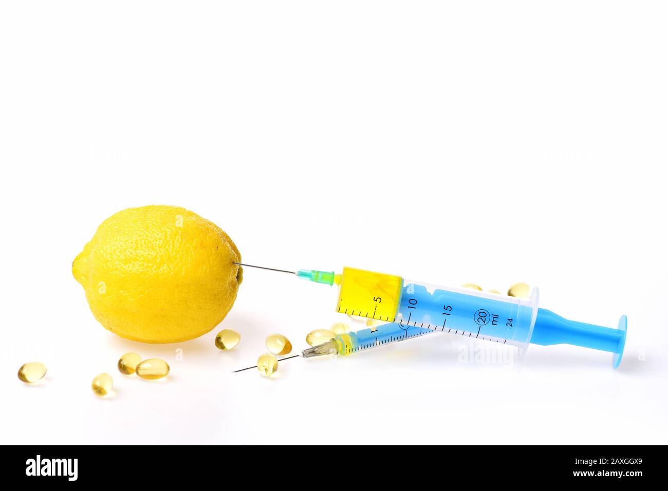 Pesticides and nitrates in food, dna modify concept. Syringes, capsules ...