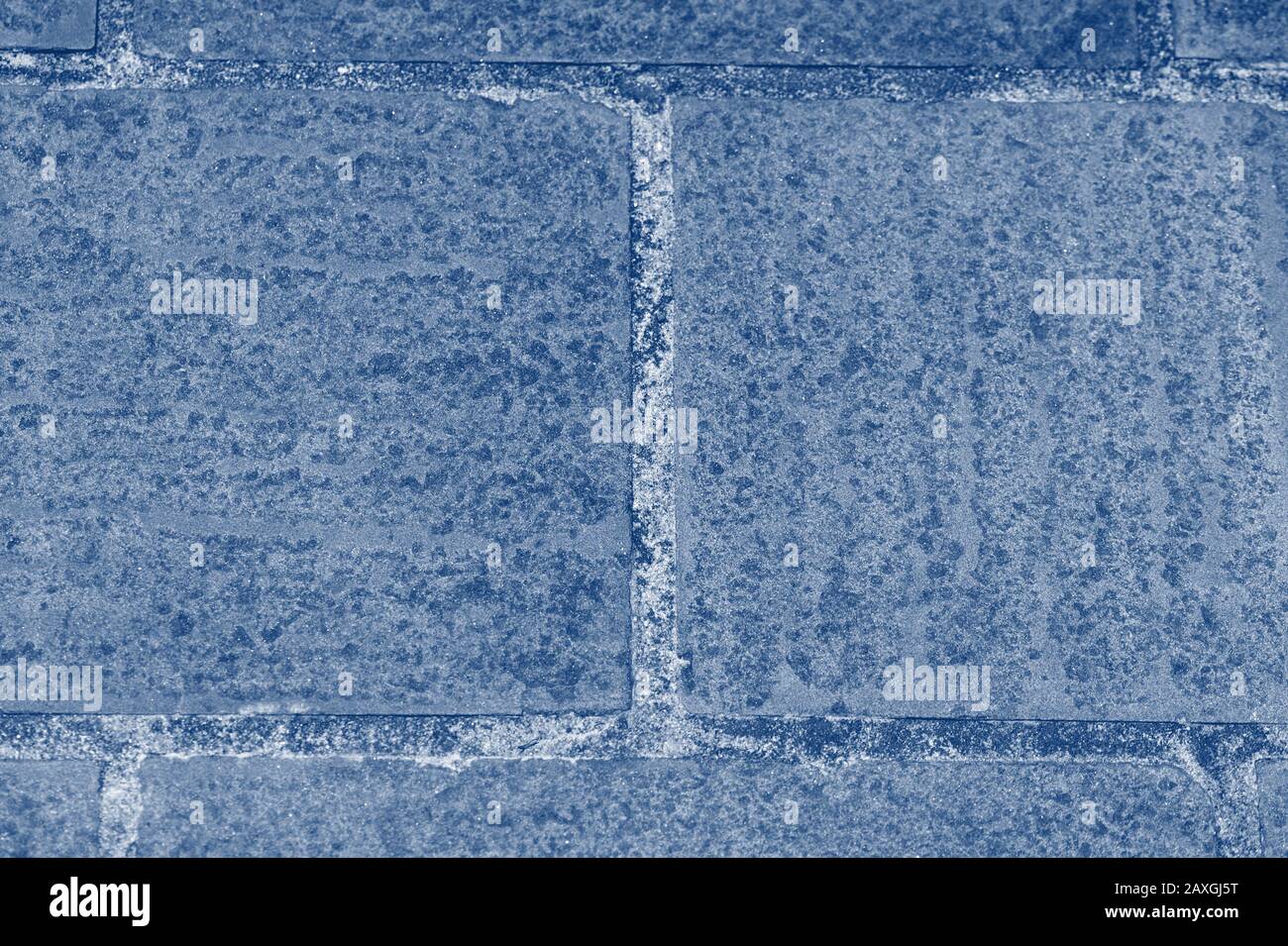 Paving slabs close-up, top view. Abstract background blue color toned ...
