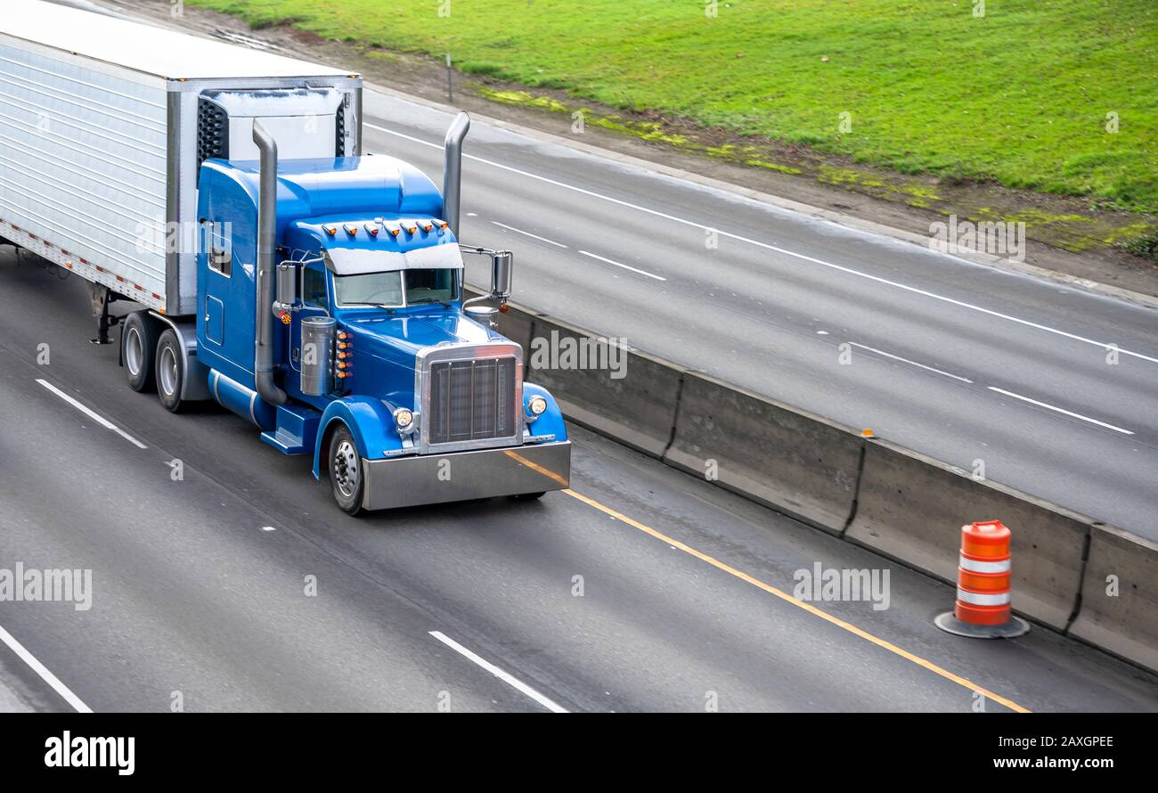 Big rig blue classic powerful diesel long haul semi truck transporting ...