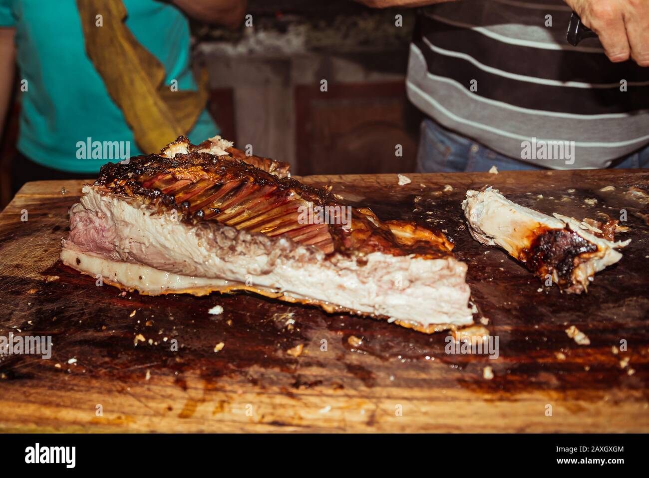 Traditional suckling pig cooked on the charcoal grill. The little pig ...