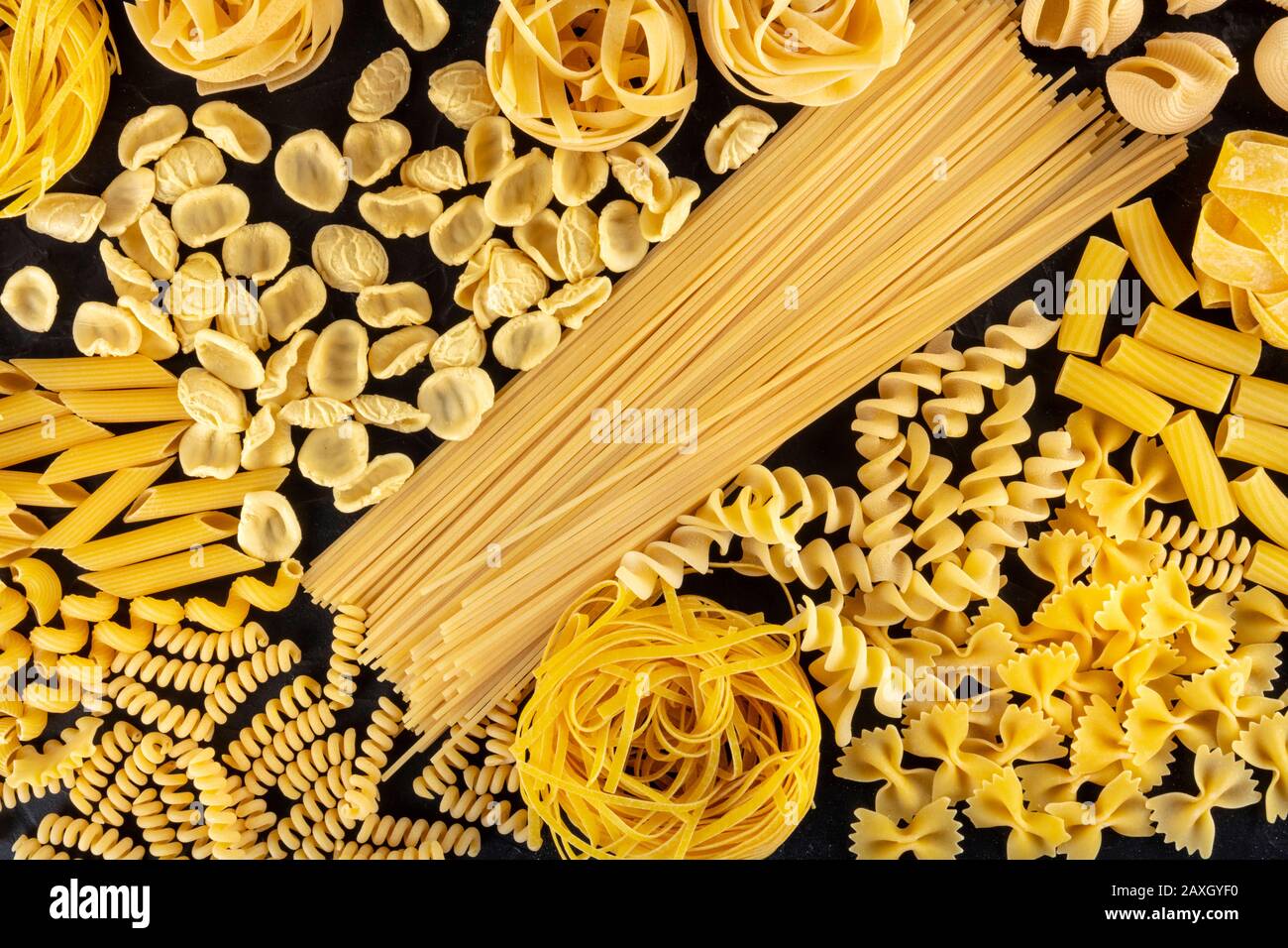 Italian pasta sorts variety, a flatlay of various pasta types, shot ...