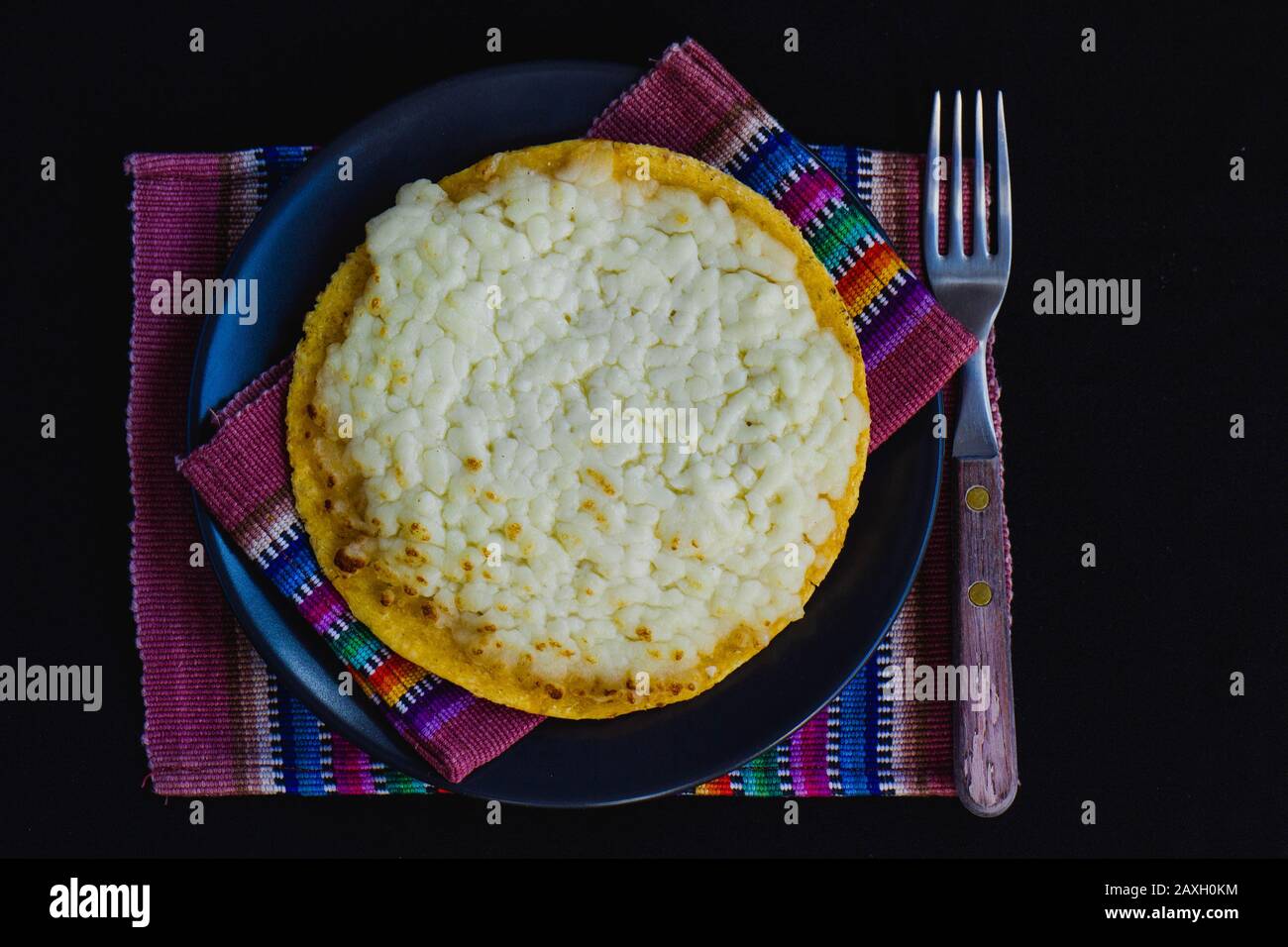 Arepa with cheese is a traditional breakfast from Colombia, made with ...