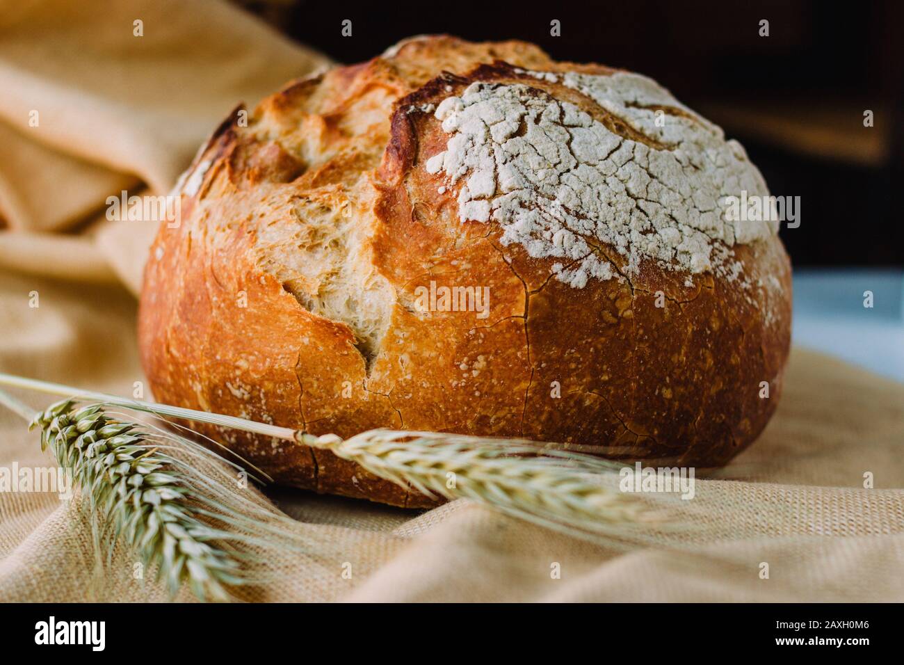 Mediterranean bread called pan de payes or pa de pages on a rustic ...