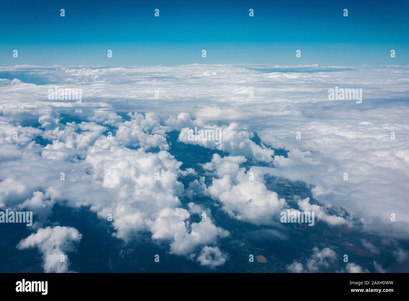 Sky with clouds from airplane window during flight Stock Photo - Alamy