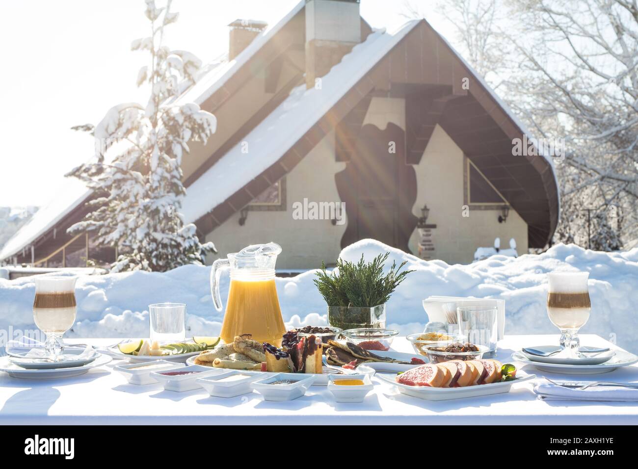 Breakfast at the restaurant in the snowy winter outdoors Stock Photo ...