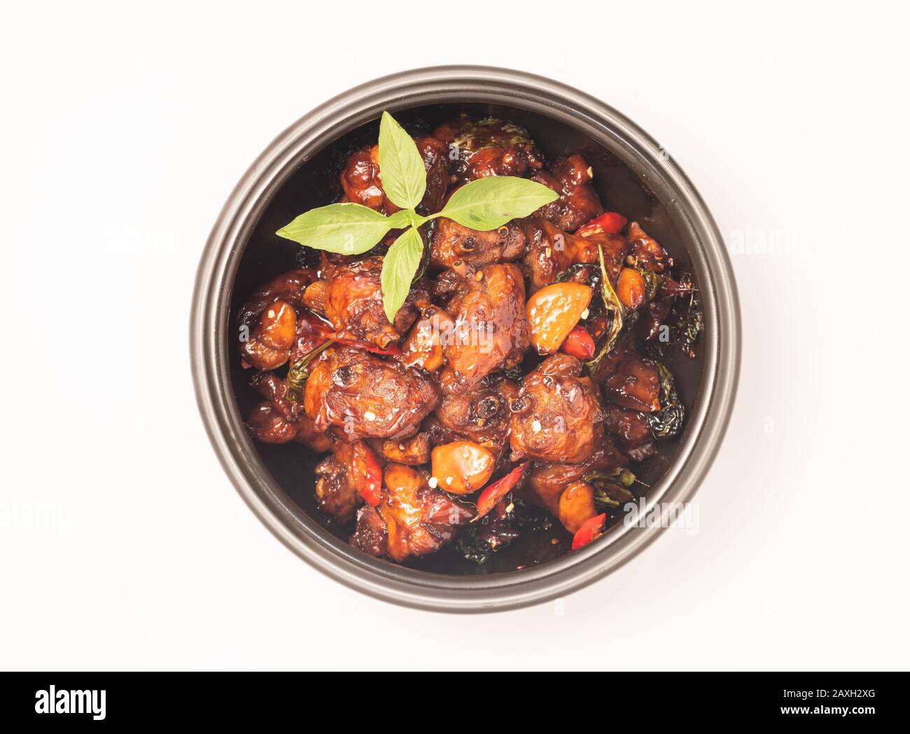 Delicious traditional Chinese three cups chicken dish on white ...