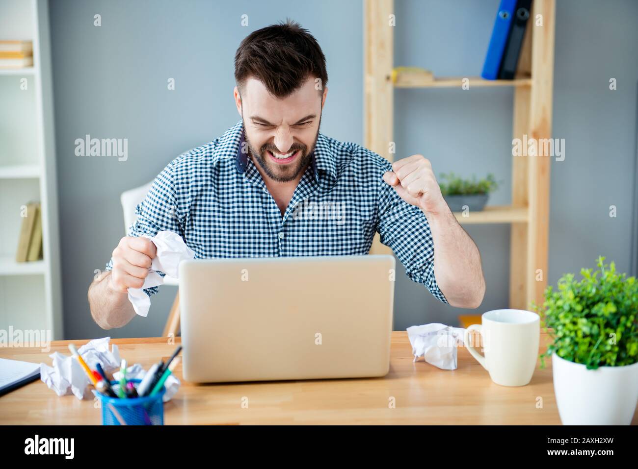 angry man in rage having bad mood working in office Stock Photo - Alamy