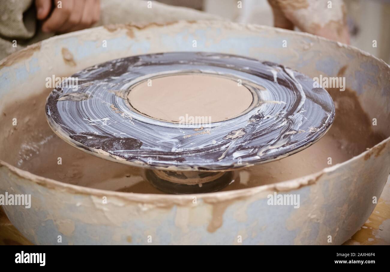 An empty circle, where the potter molds product close-up. Creative ...