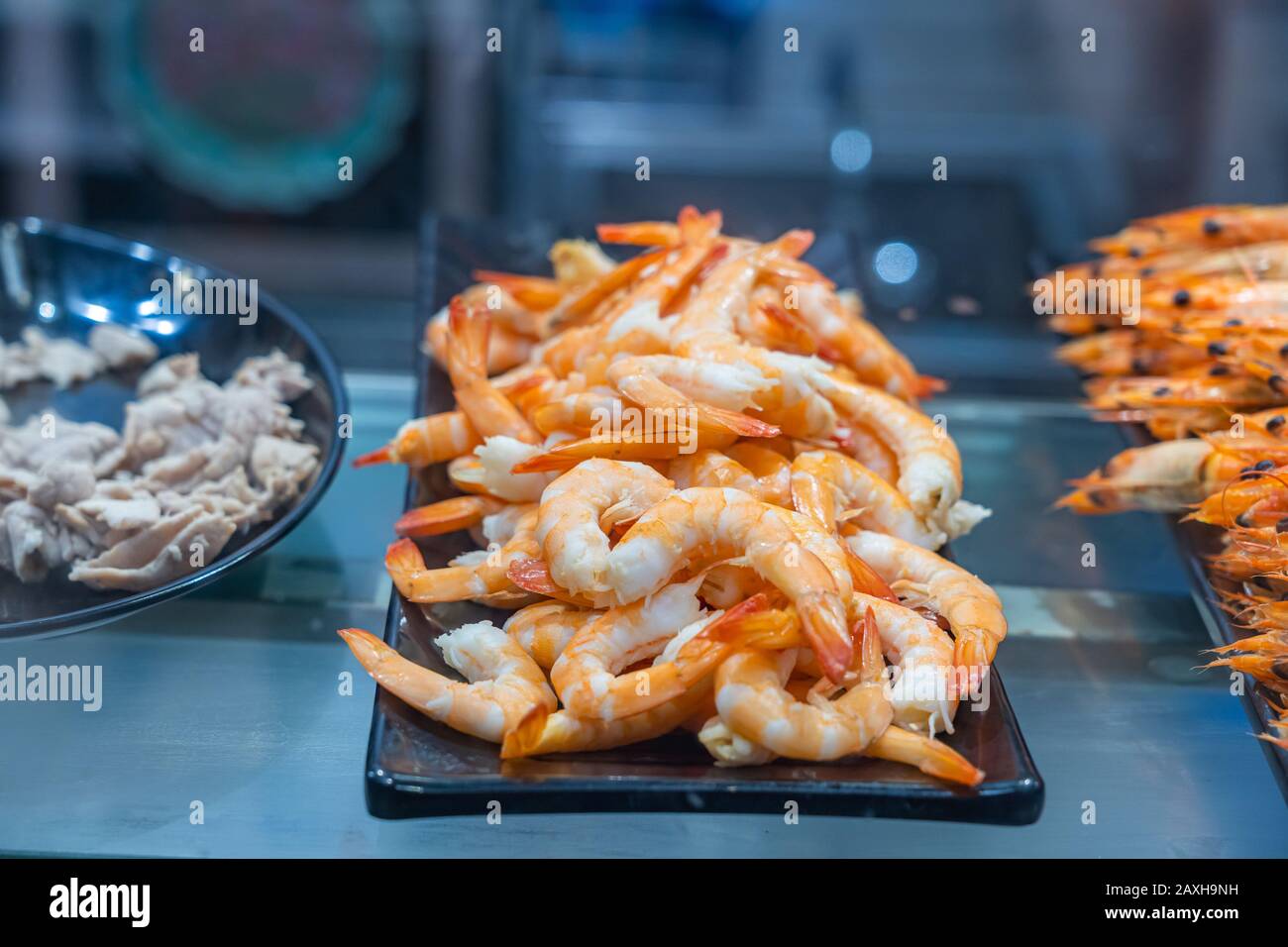 Fresh cooked and peeled shrimps on the plate in kitchen Stock Photo - Alamy