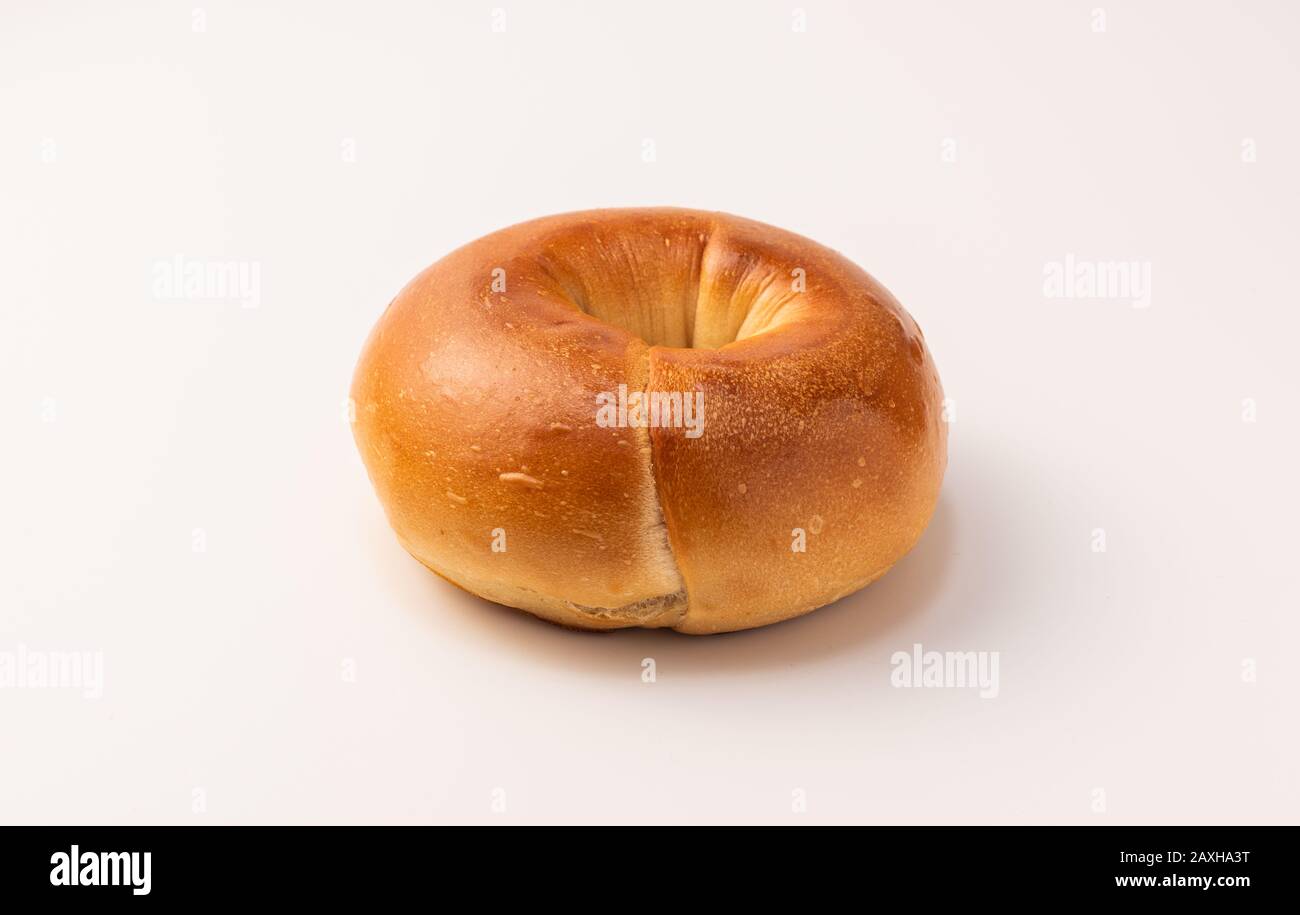Simple Bagel on white background Stock Photo - Alamy