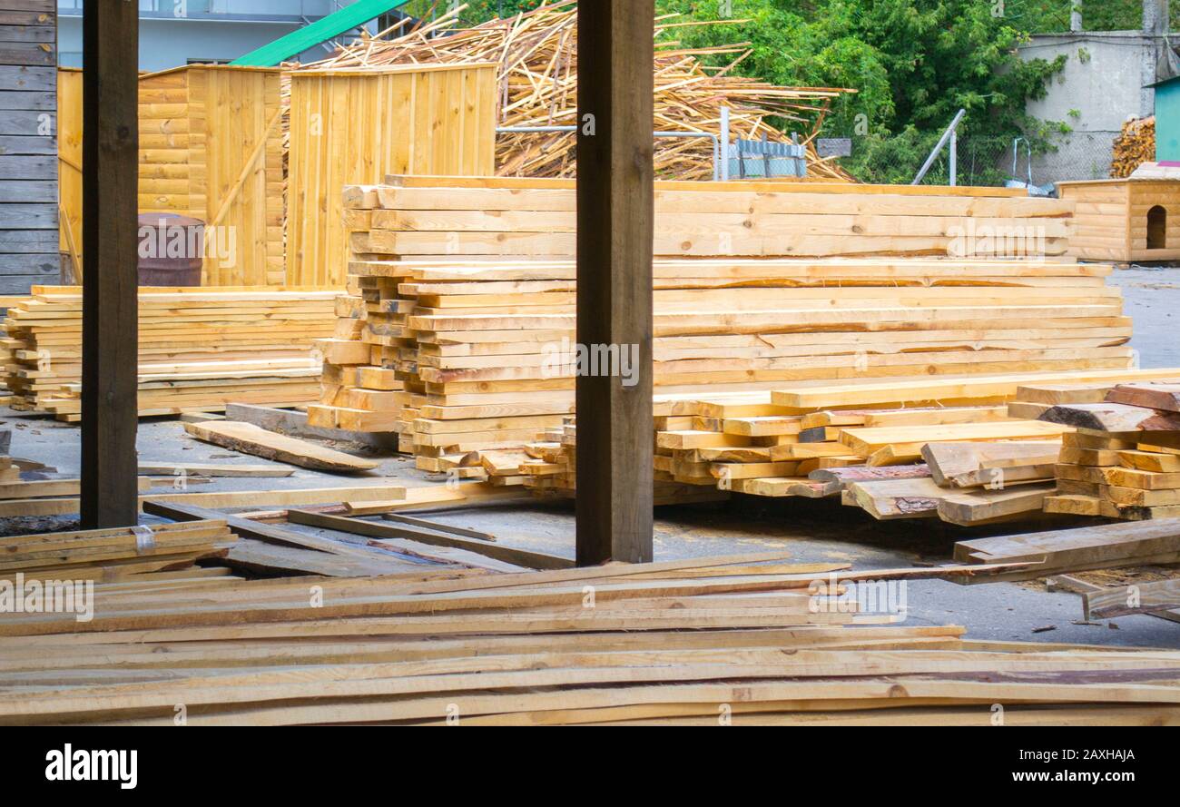 Sawmill. Warehouse for sawing boards on a sawmill outdoors. Wood timber ...
