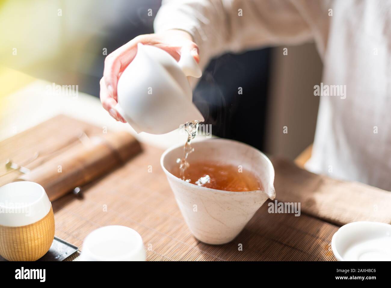 Pouring tea ceremony hi-res stock photography and images - Alamy
