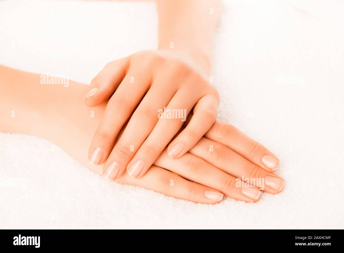 Woman's hands with beautiful manicure isolated on white background ...