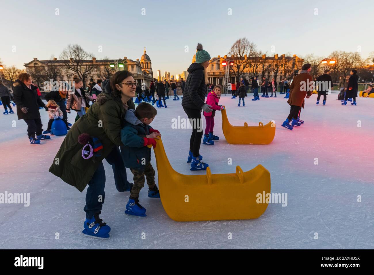 England, London, Greenwich, Adults and Children Ice Skating at The ...