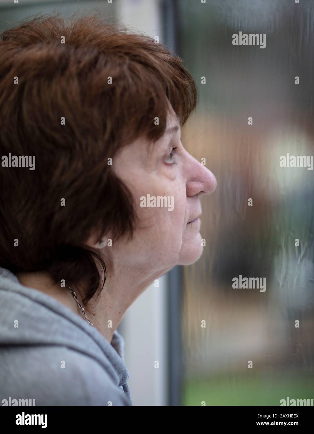 Watching rain from window hi-res stock photography and images - Alamy