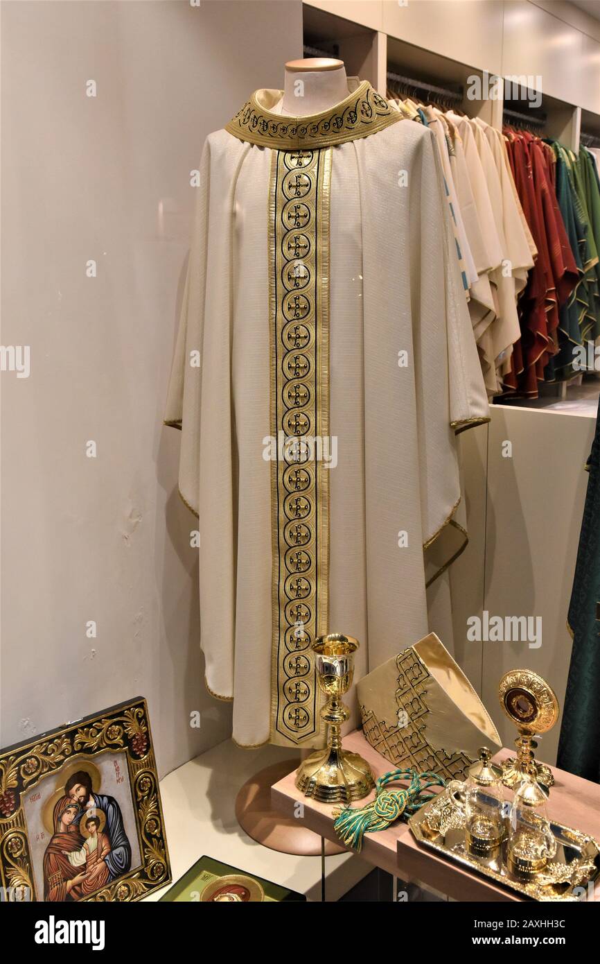 RELIGIOUS CLOTHES AND OBJECTS ON DISPLAY IN A SHOP IN THE HISTORIC ...
