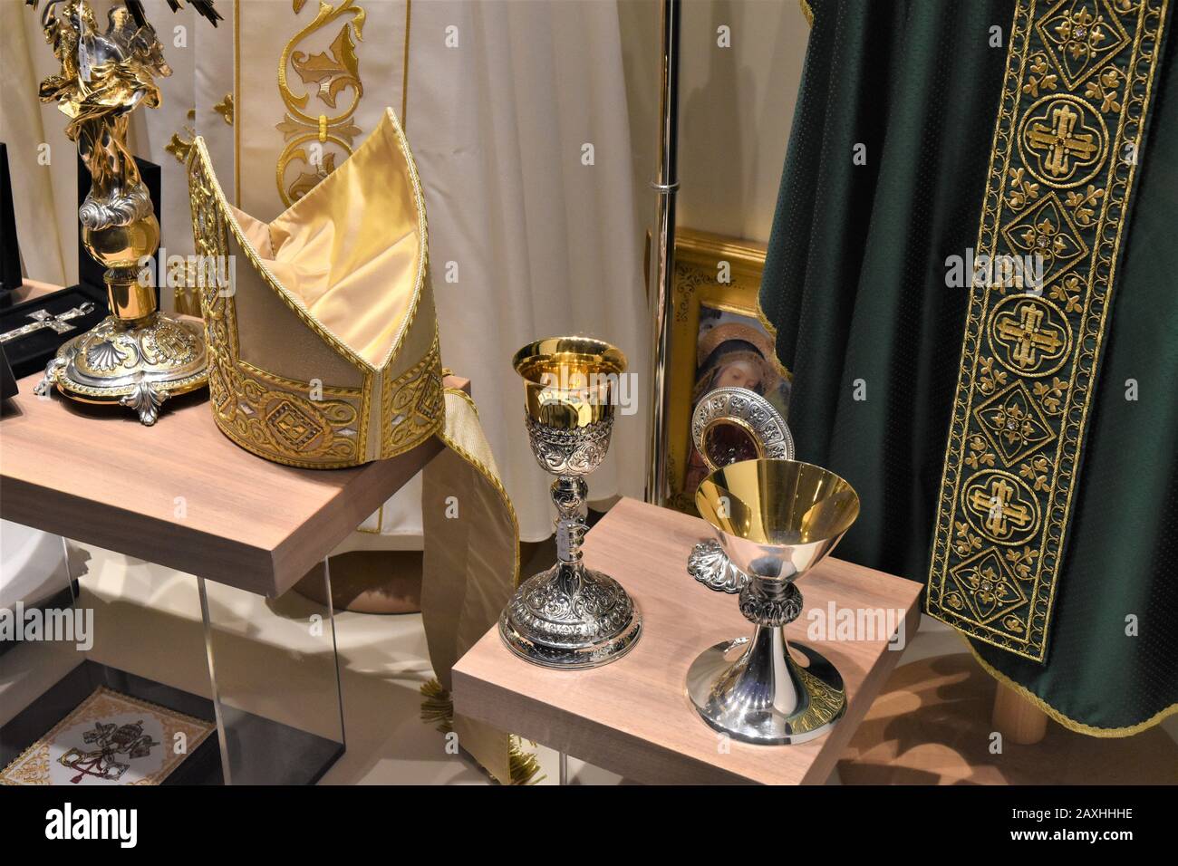 RELIGIOUS CLOTHES AND OBJECTS ON DISPLAY IN A SHOP IN THE HISTORIC ...