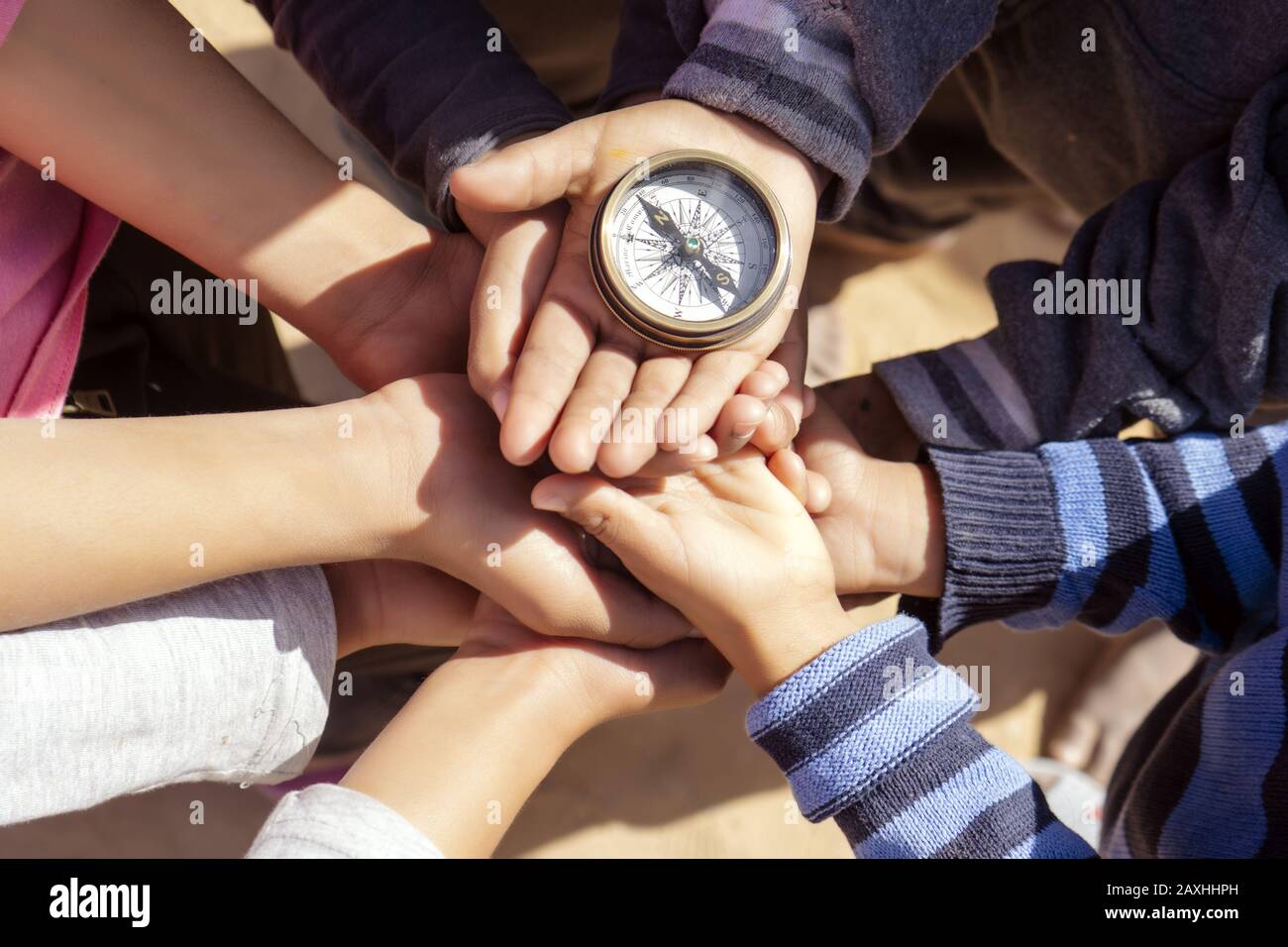 Handshake children group hi-res stock photography and images - Alamy
