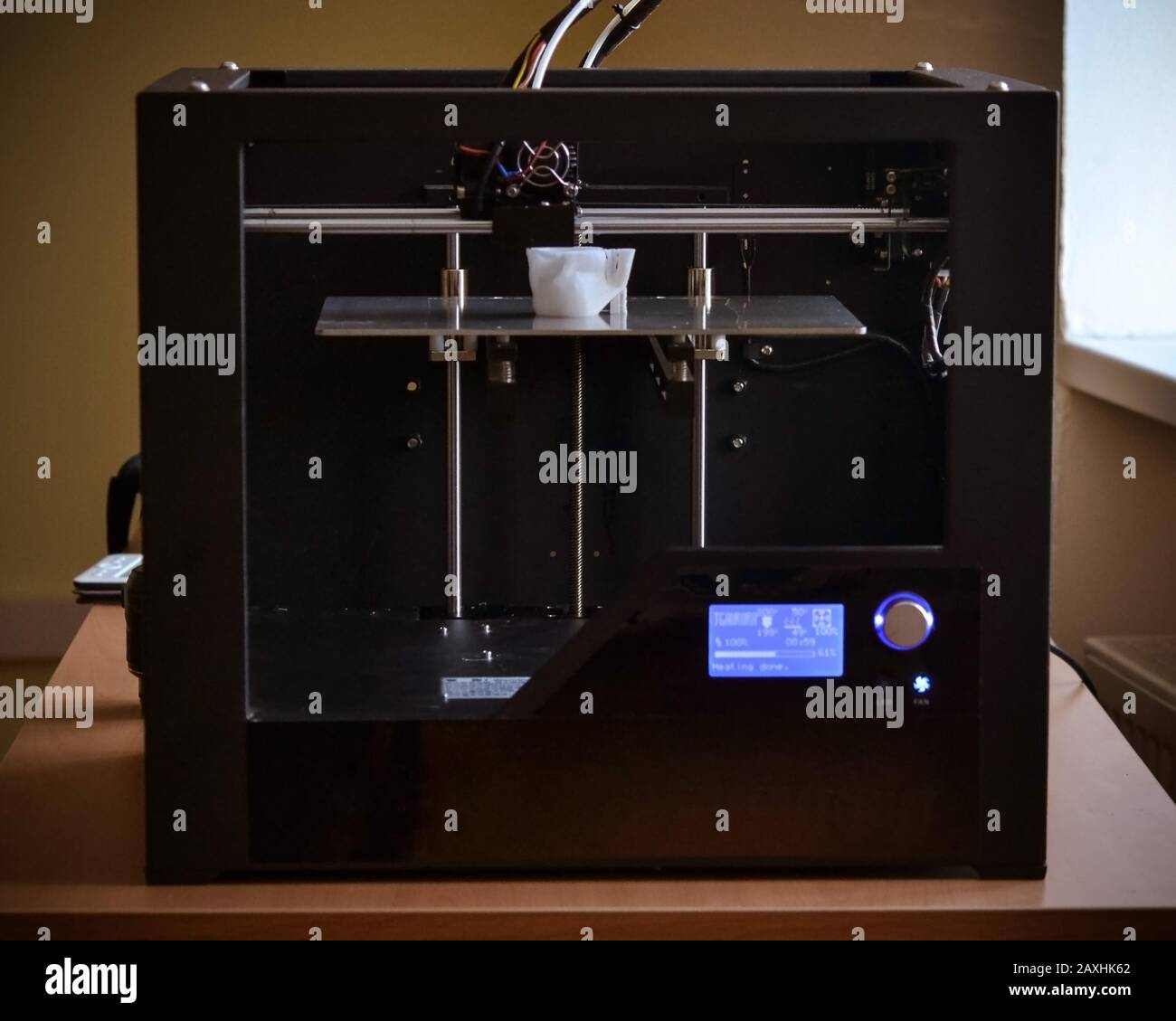 Objects printed by 3d printer. Automatic three dimensional 3d printer ...