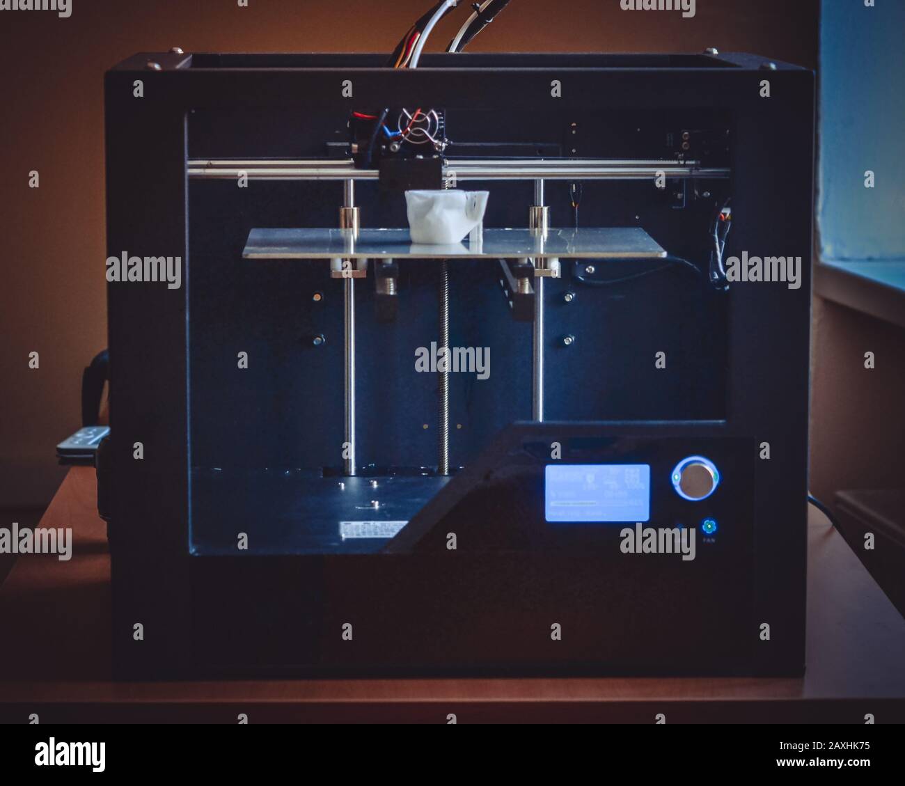 Objects printed by 3d printer. Automatic three dimensional 3d printer ...