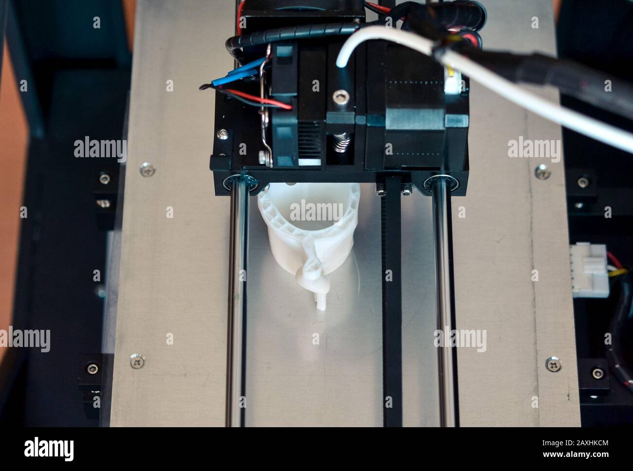 Objects printed by 3d printer. Automatic three dimensional 3d printer ...