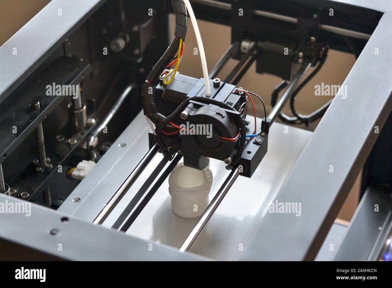 Objects printed by 3d printer. Automatic three dimensional 3d printer ...