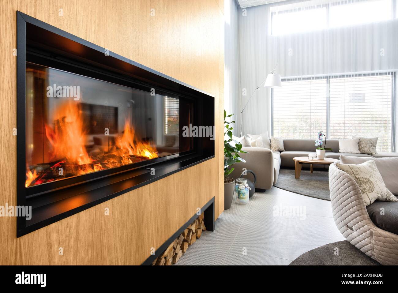 large, modern, glass fireplace in a modern interior Stock Photo - Alamy
