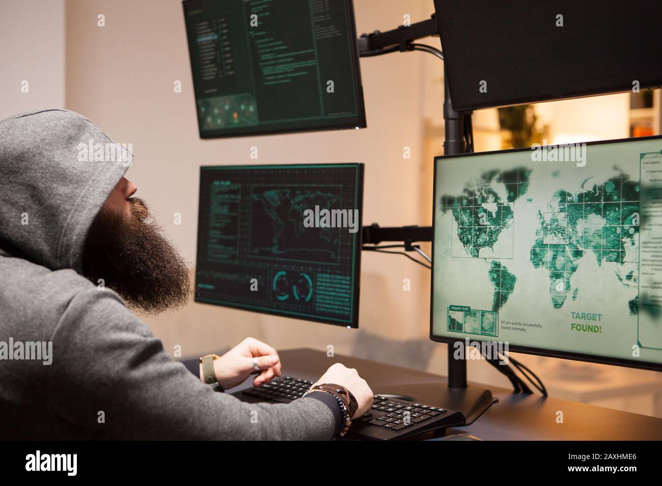 Hacker typing on futuristic computer hi-res stock photography and ...