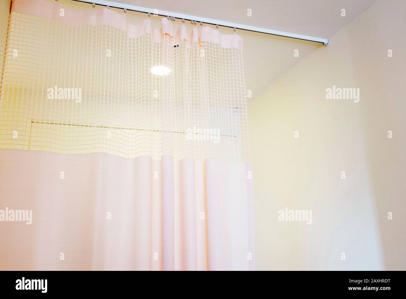 Medical curtain hanging from a railing in a hospital room, Privacy ...