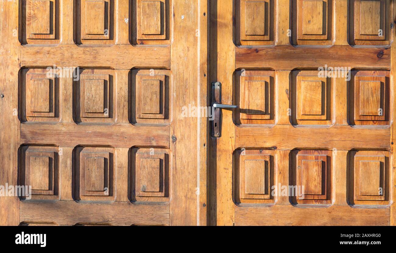 Wide shot of wooden doors that have been crafted in rectangular shapes ...