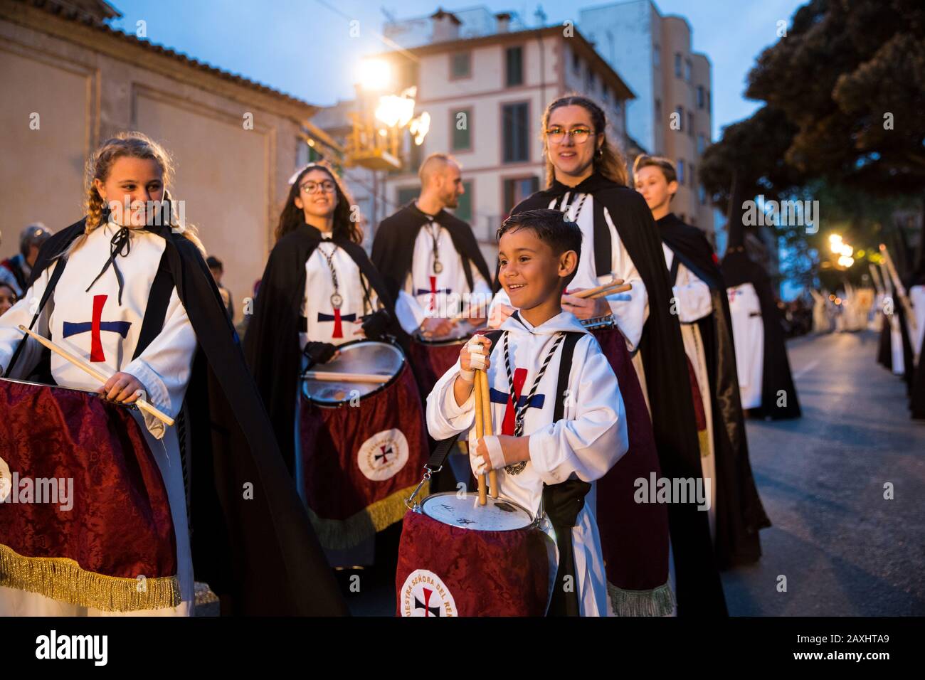 Holy Thursday procession of church brotherhood penitents in conical ...