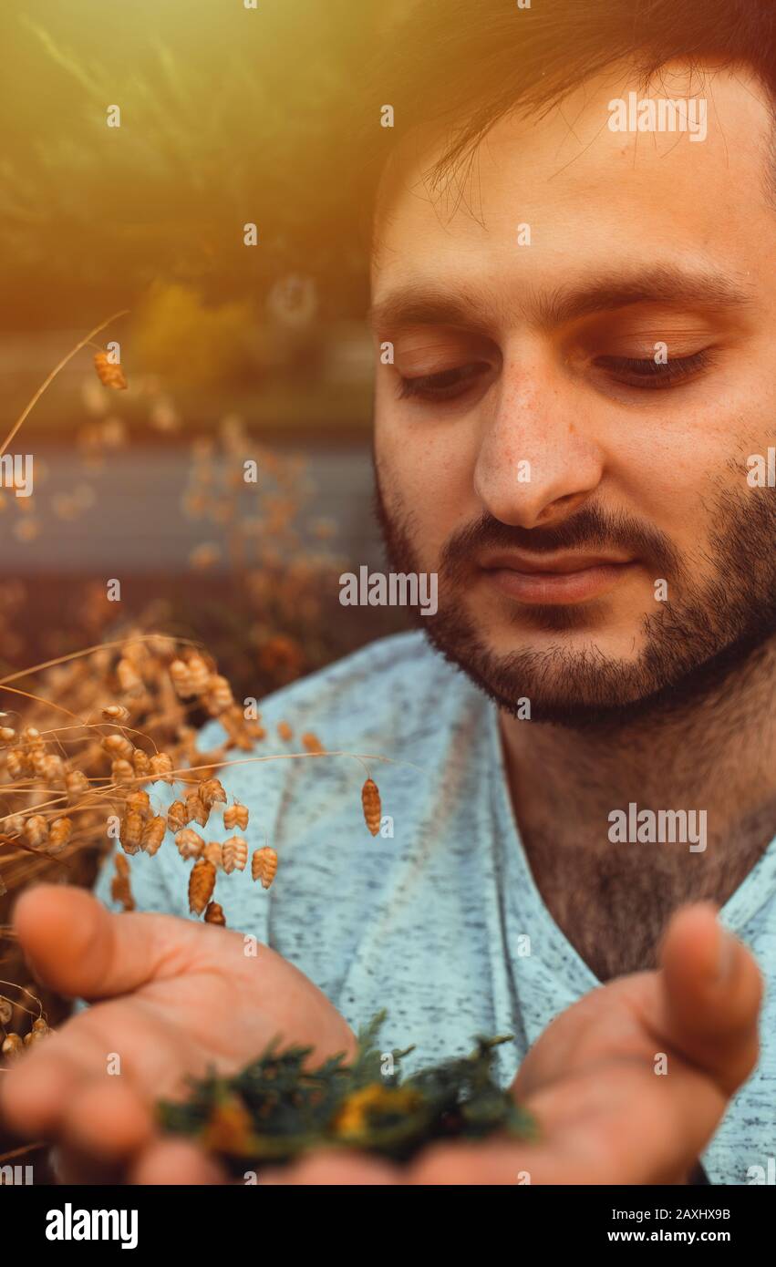 Man in flower field hi-res stock photography and images - Alamy