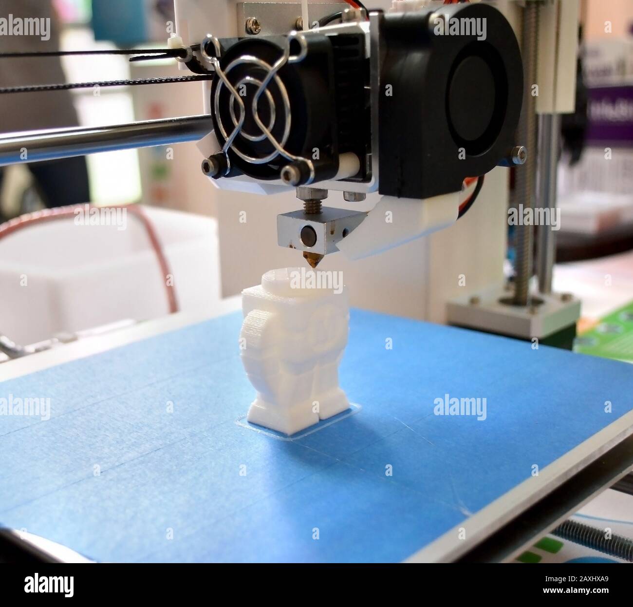 The process of working 3D printer and creating a three-dimensional object. Progressive modern ...