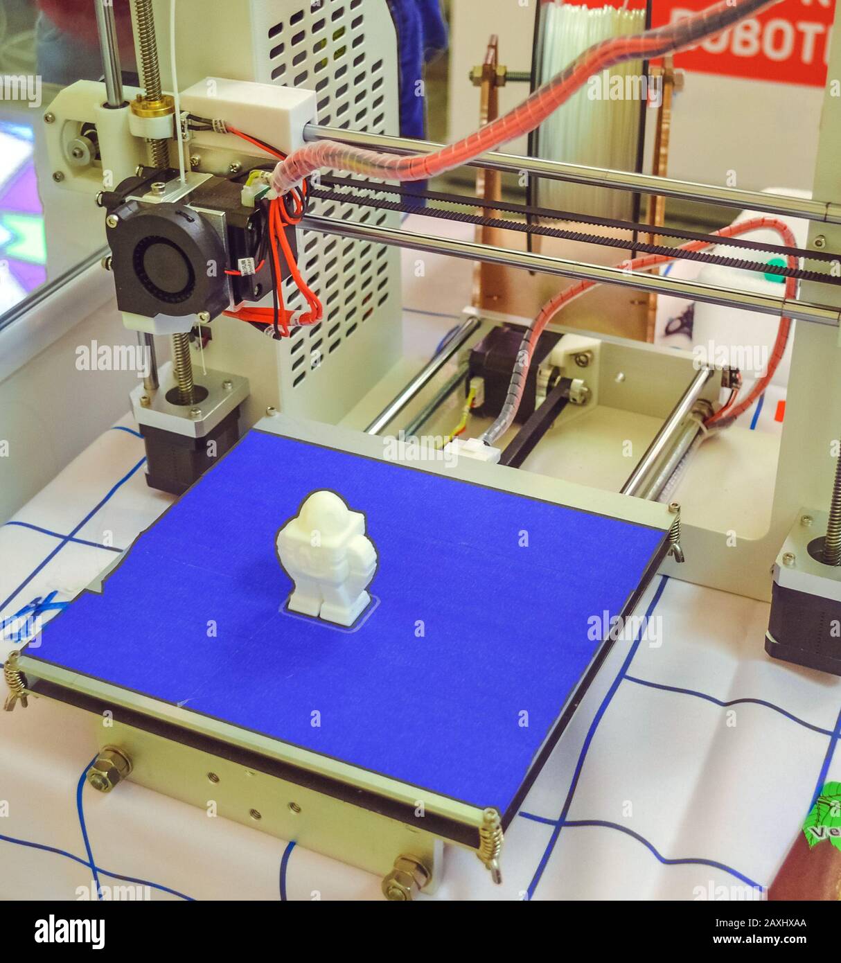 The process of working 3D printer and creating a three-dimensional object. Progressive modern ...
