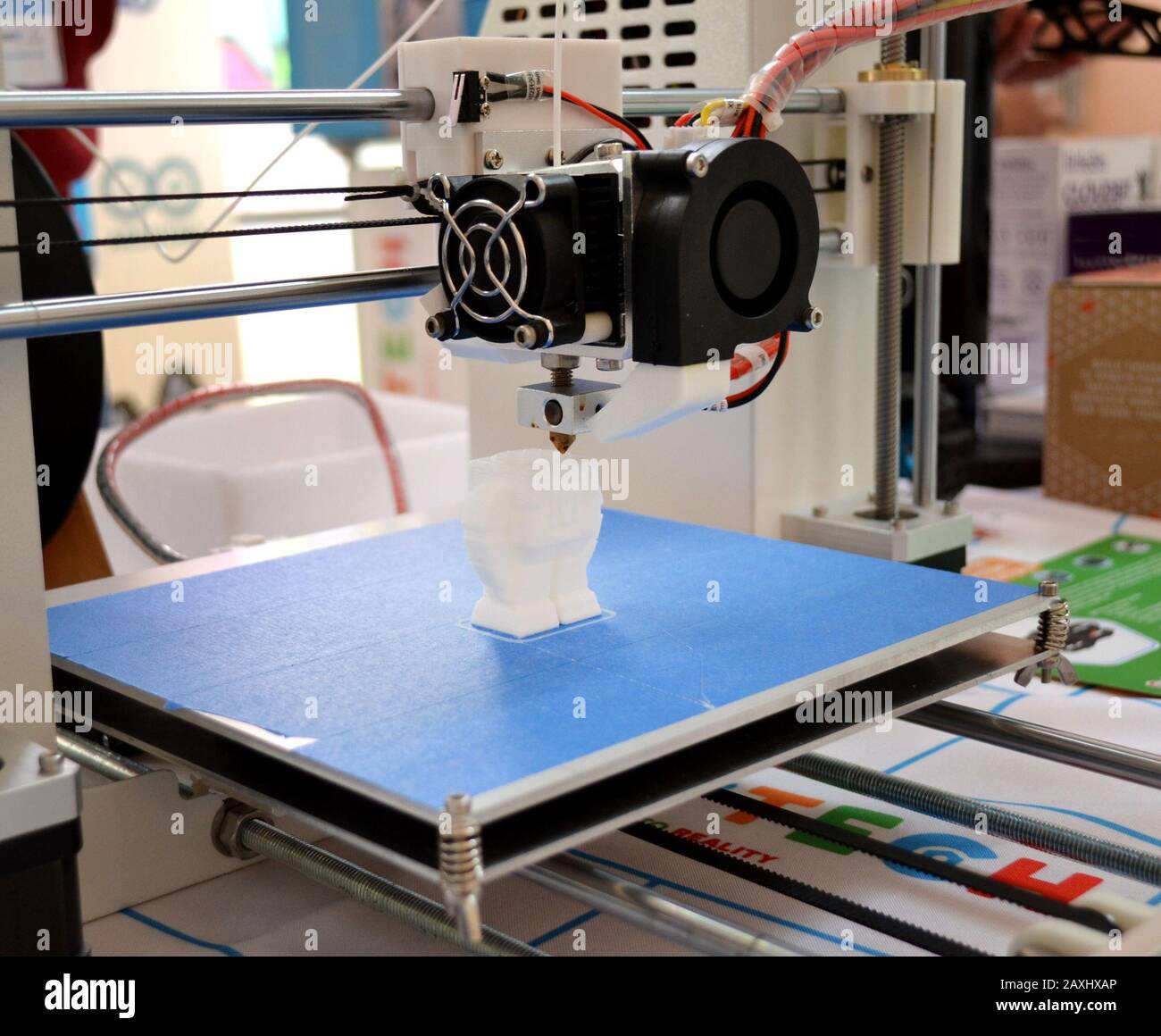 The process of working 3D printer and creating a three-dimensional object. Progressive modern ...